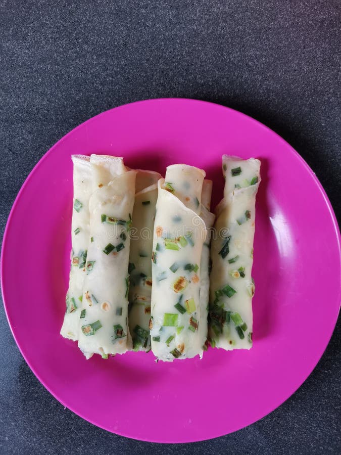 Spring Onion Roll Pancakes on a Pink Plate Stock Photo - Image of lunch ...