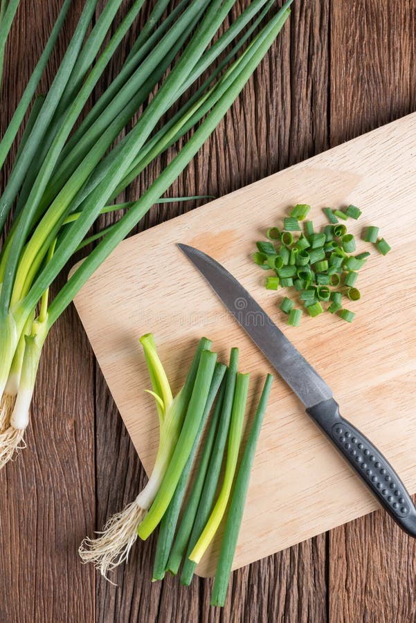 Spring Onions on a Cutting Board. Stock Photo - Image of green, cutting ...