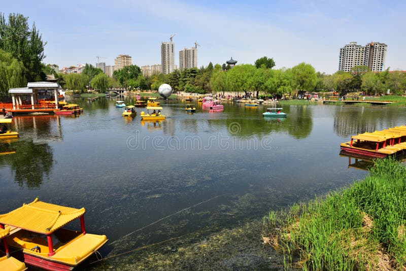 Spring outing in the park editorial photo. Image of bridge - 276010186