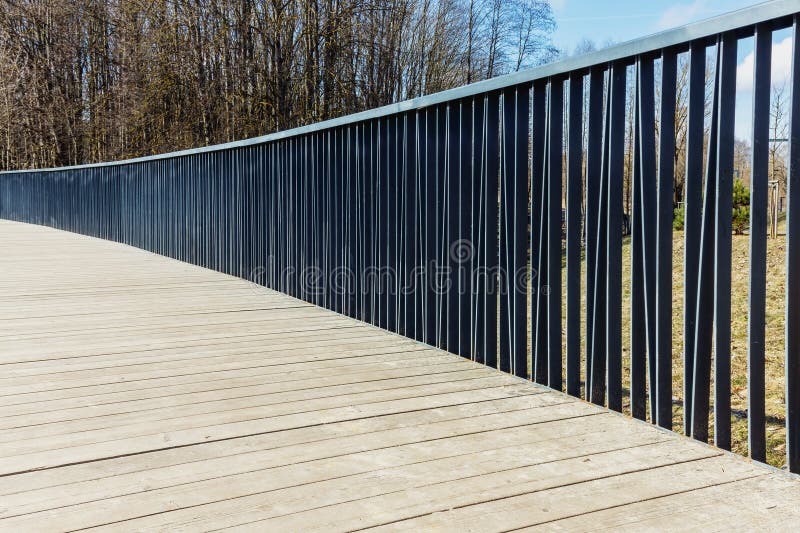 In the Spring, a Pedestrian Bridge with Metal Railings Stock Photo ...