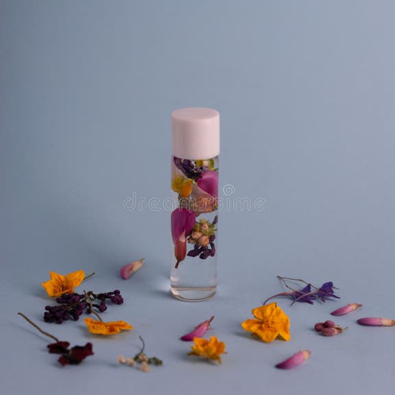 Spring Perfume on Floral Blue Background Top View Floral Spring ...