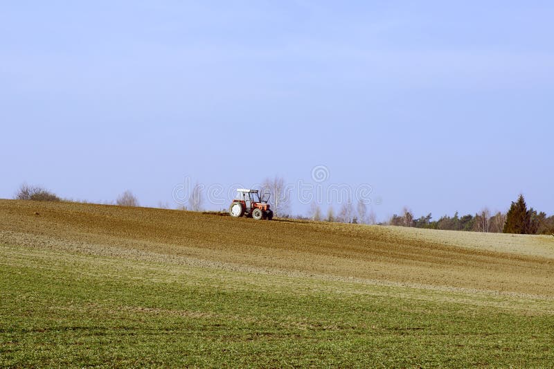 Spring plowing tractor stock photo. Image of plant, spring - 38380534