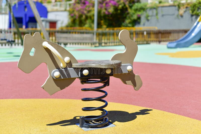 Spring Rider at the Playground Stock Image - Image of recreation ...