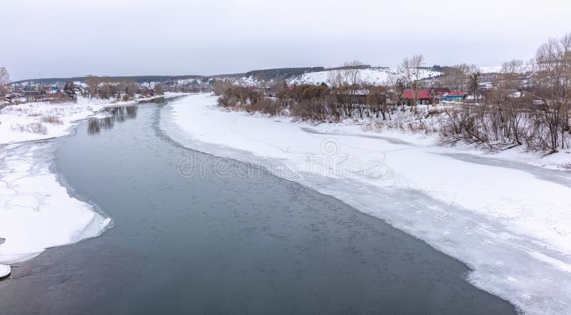 The Spring River in the Village Began To Thaw from the Ice.the Ice in ...