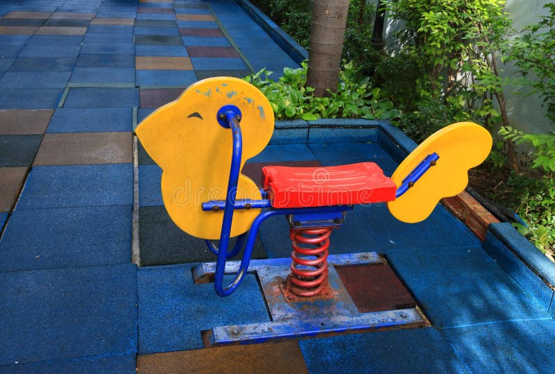 Spring Rocker in Playground Stock Photo - Image of bounce, people ...