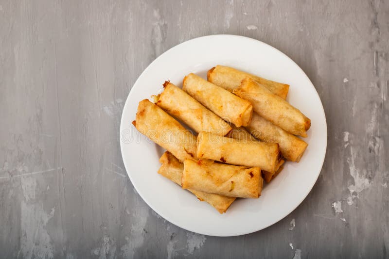 Spring Roll Also Known As Egg Roll on White Dish Stock Photo - Image of ...