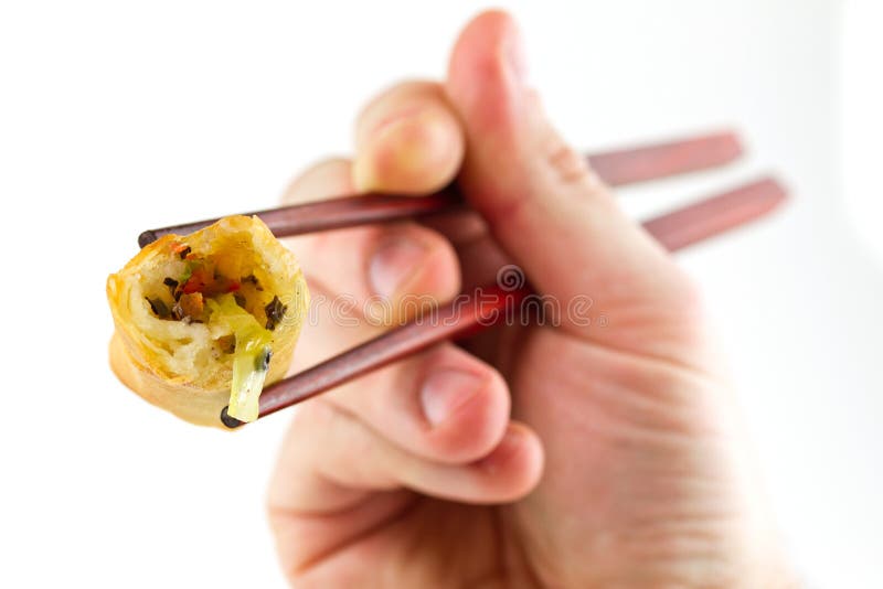 Spring roll on chopsticks stock photo. Image of delicious - 19640246