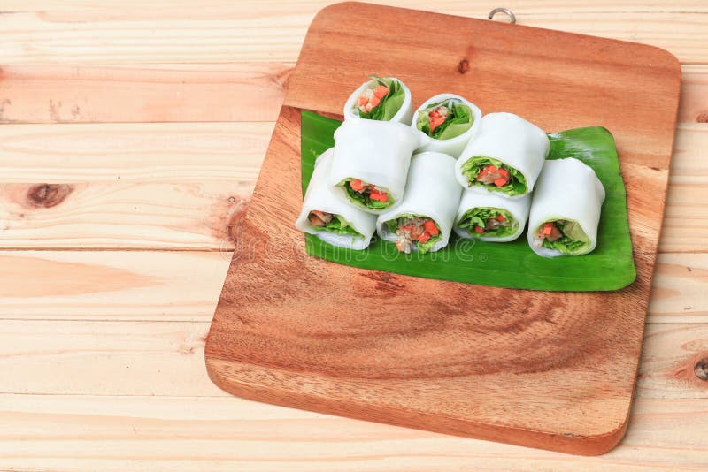 Spring Roll Cut with Vegetable on Banana Leaf Wood Floor Background ...