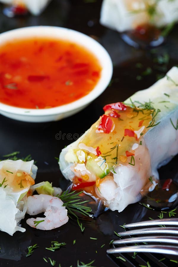Spring Rolls with Shrimps and Sauce on Dark Plate Stock Image - Image ...