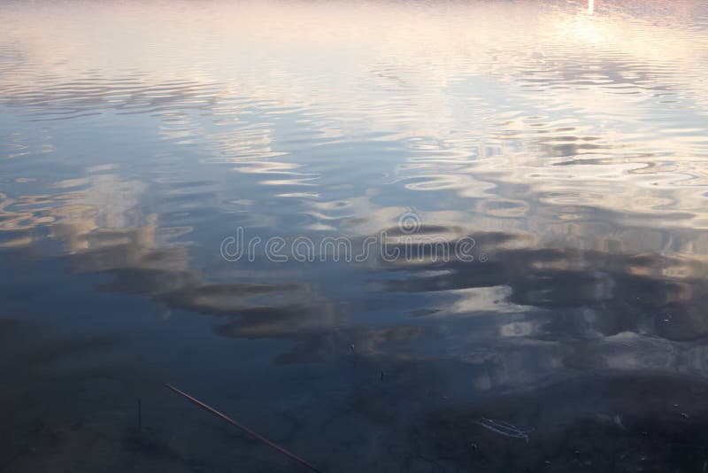 Spring Sky Reflection in Water of Lake. Stock Photo - Image of ripple ...