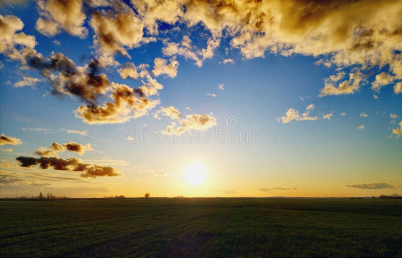 A Beautiful Sunset on the Spring Fields Stock Image - Image of stunning ...