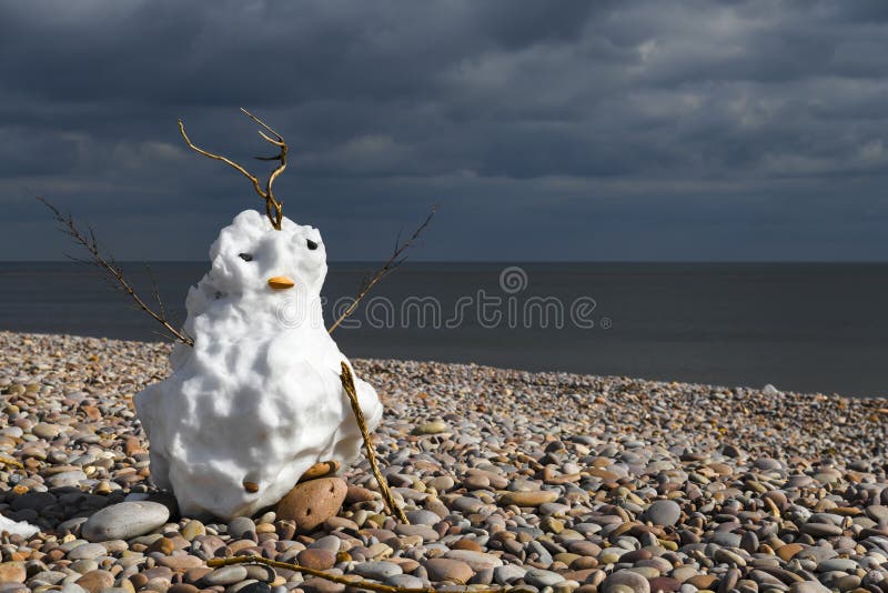 Spring Snowman stock image. Image of melting, clouds - 130566455