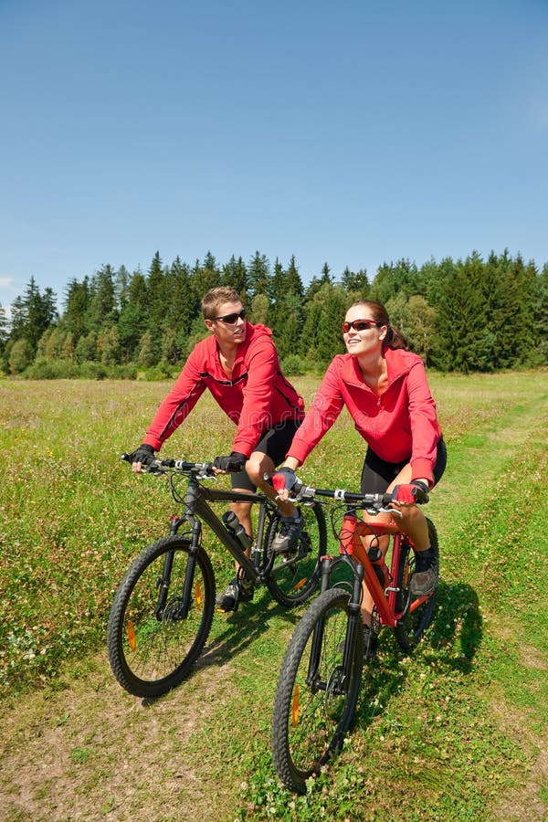 Spring - Sportive Couple Biking in Nature Stock Photo - Image of biking ...
