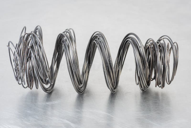 Spring Steel Hard Wire on Matal Table Stock Image - Image of metal ...