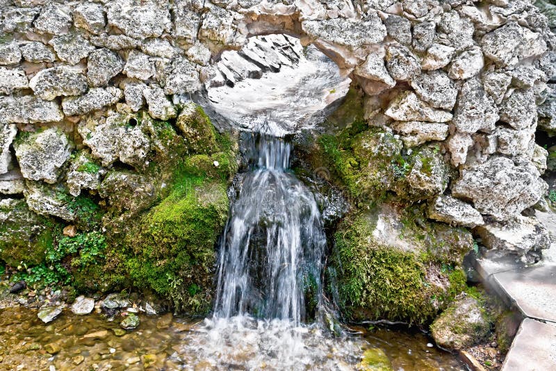 Spring from stone gutter stock image. Image of nature - 310494017
