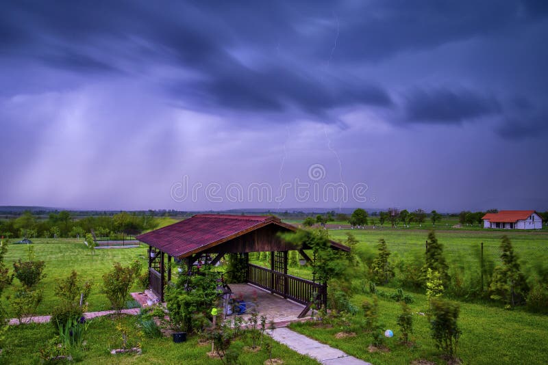 Storm clouds at the spring stock image. Image of field - 164754027
