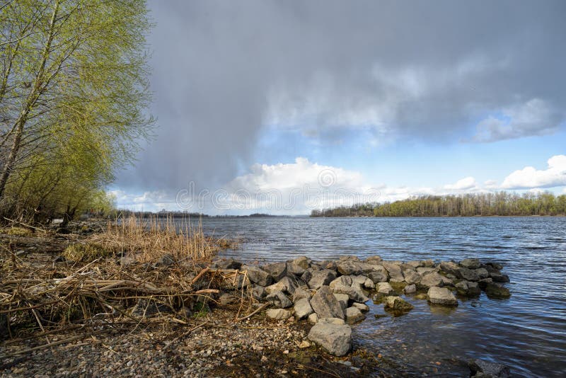 Spring Storm Over the River Stock Photo - Image of darkness, cloud ...