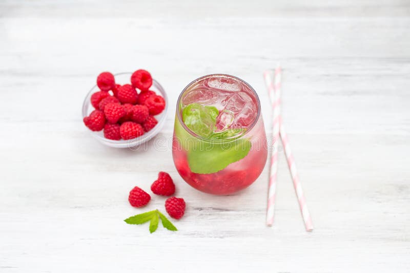 Spring or Summer Refreshing Cold Water with Raspberry and Ice. Berry ...