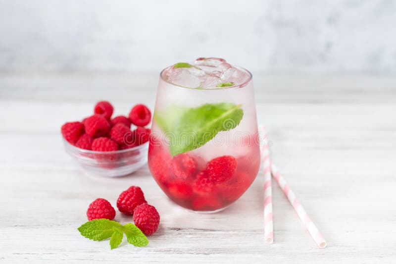 Spring or Summer Refreshing Cold Water with Raspberry and Ice. Berry ...