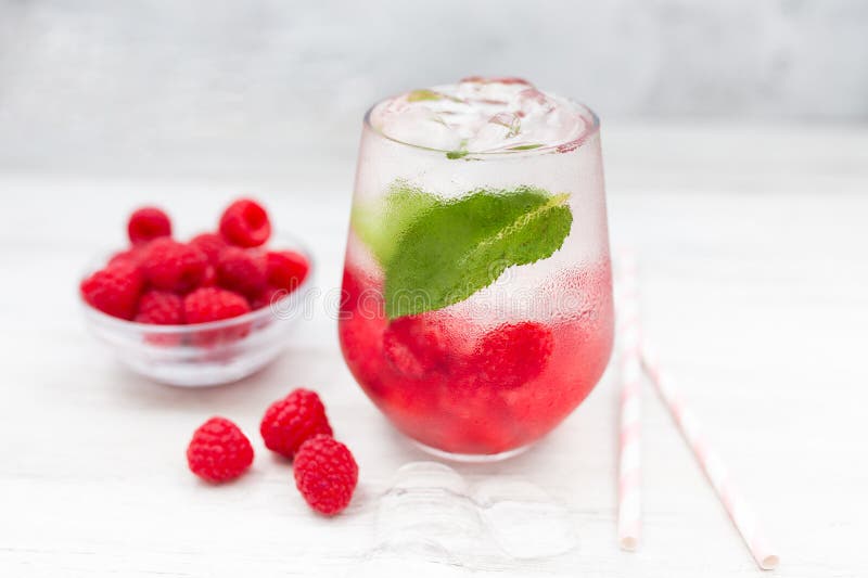 Spring or Summer Refreshing Cold Water with Raspberry and Ice. Berry ...