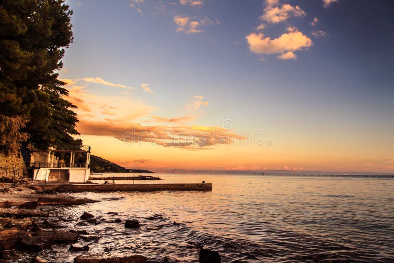 Sunset at the sea, Trieste stock photo. Image of beautiful - 117052720