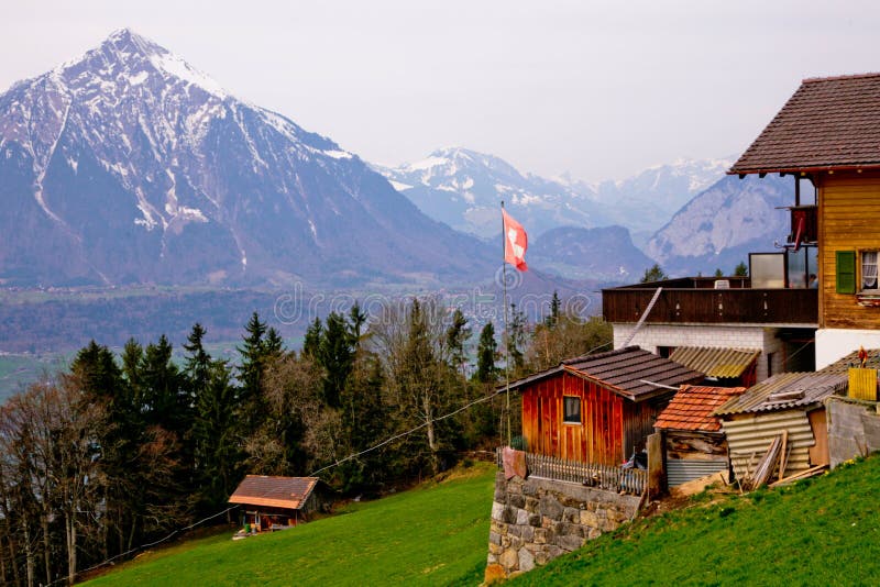 Spring in Swiss Alps stock image. Image of alpine, house - 13918727