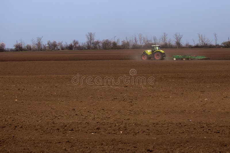 Spring Tillage of Arable Land Stock Image - Image of driving, harrowing ...