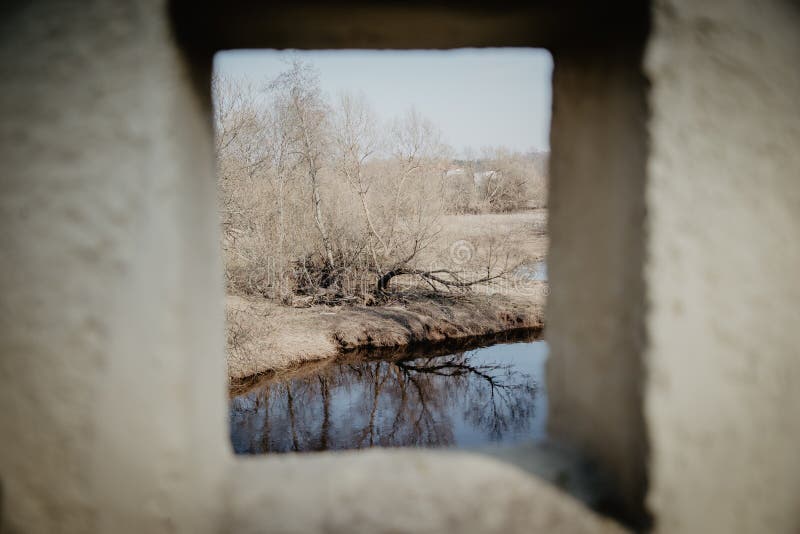 Spring Tree Landscape through a Concrete Structure Forming a Frame ...