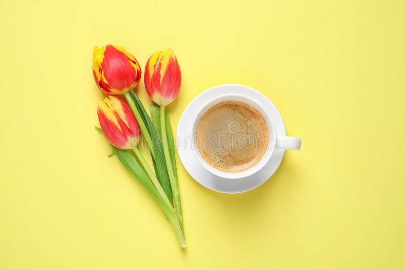 Spring Tulips and Coffee on Yellow Background. Good Morning Stock Image ...