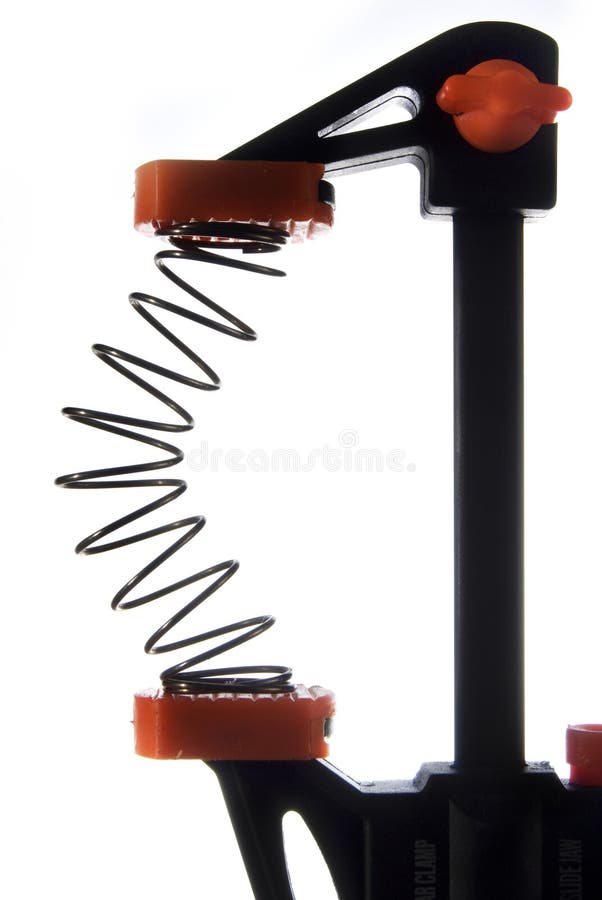Spring under tension stock image. Image of spiral, compressed - 8833009