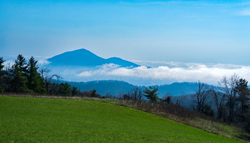 A Spring View of Devils Backbone and Valley Clouds Stock Image - Image ...