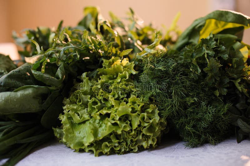 Spring Vitamin Set of Various Green Leafy Vegetables on the Table ...