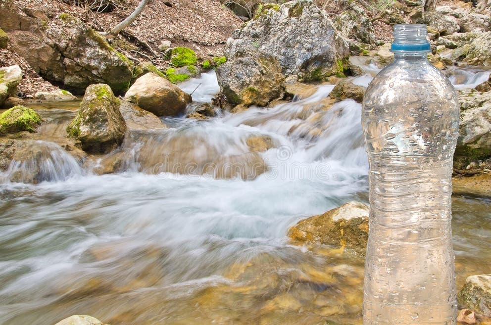 Spring water and bottle stock photo. Image of freshness - 24389556