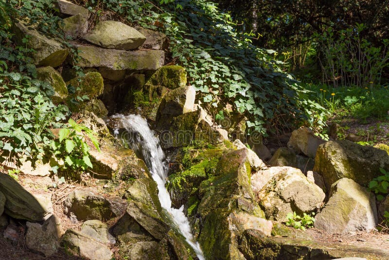 Spring, Water Flows from the Rock Stock Image - Image of peaceful ...