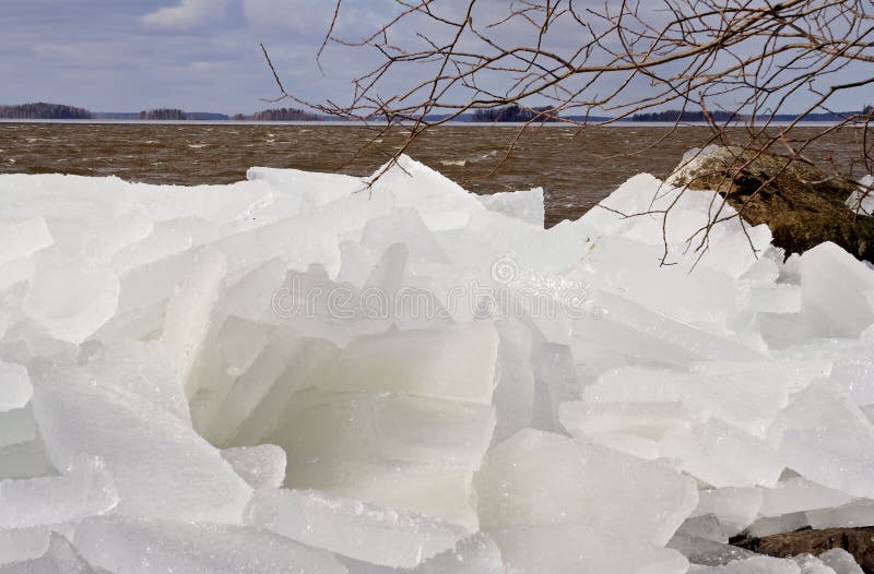 The Spring Wind Lifts Heap of Ice Onto the Shore Stock Photo - Image of ...