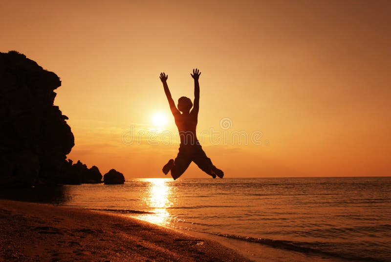 Springende mensen stock foto. Image of avontuur, steen - 1488732