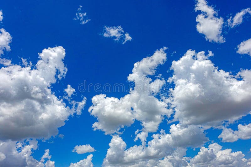 Springtime Sky and Fluffy White Clouds Stock Photo - Image of fluffy ...