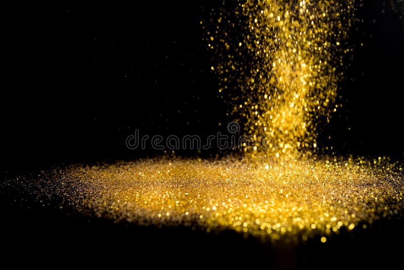 Sprinkle Gold Dust on a Black Background Stock Image - Image of ...