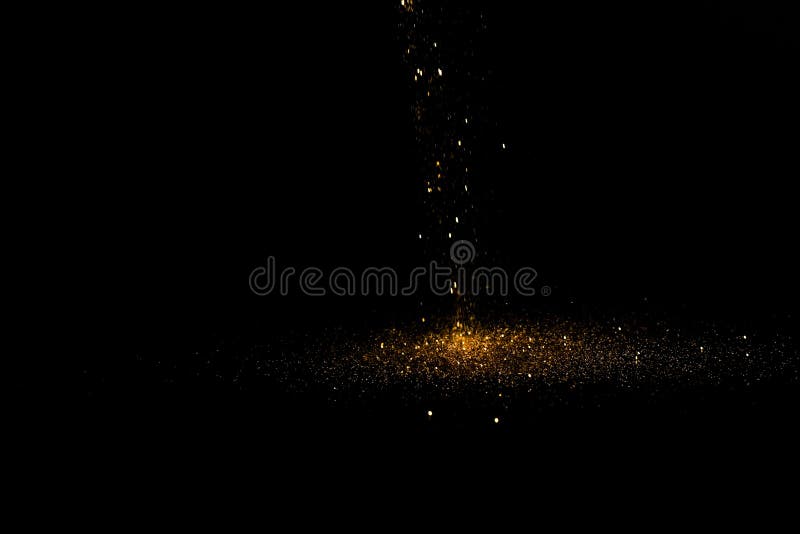 Sprinkle Gold Dust on a Black Background Stock Image - Image of ...