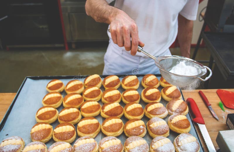 Sprinkle the Pastry with Powdered Sugar through a Sieve Stock Photo ...