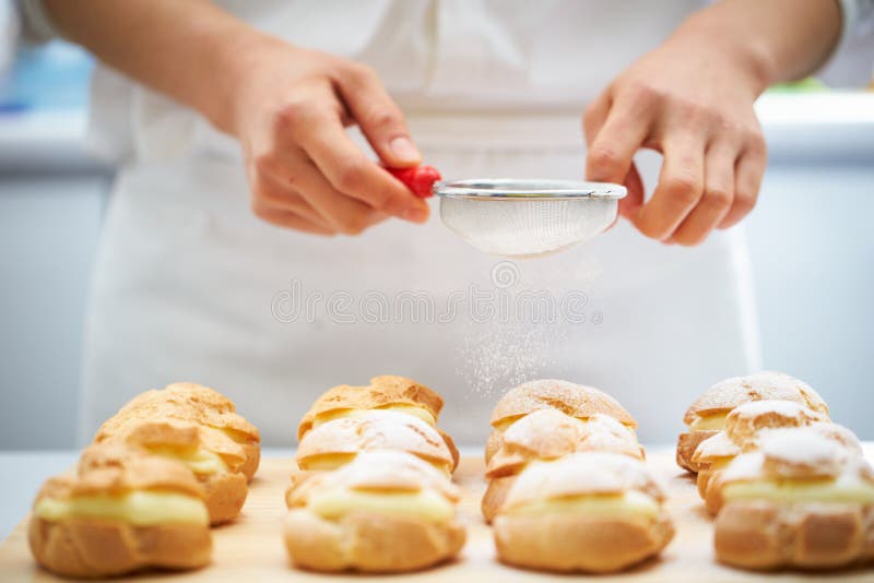 Sprinkle Powdered Sugar on Bread Stock Photo - Image of kitchen, pastry ...