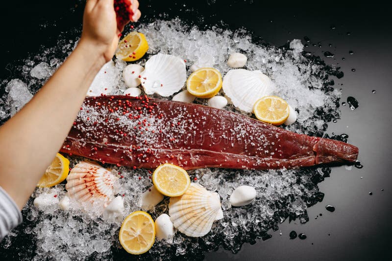 Sprinkle Red Fish Fillets with Salt Stock Photo - Image of movement ...