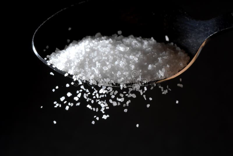 A Sprinkle of Salt from a Spoon Stock Photo - Image of blood, tasty ...