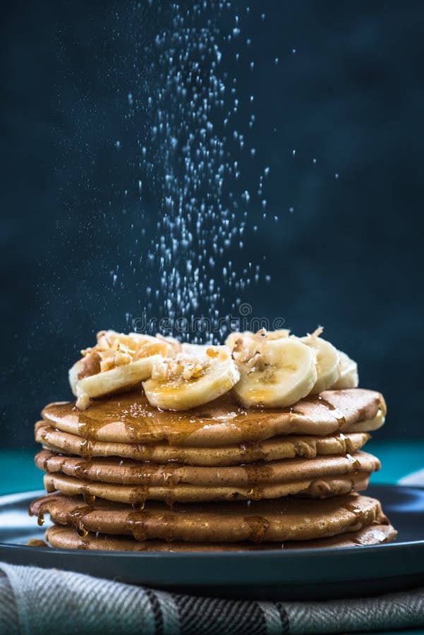 Sprinkle of Sugar Flying Over Pancakes Stock Photo - Image of brunch ...