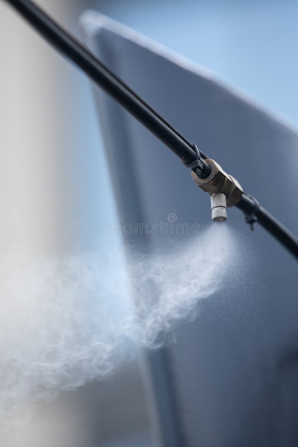 Sprinkler Head from a High Pressure Outdoor Cooling System for Cafe ...