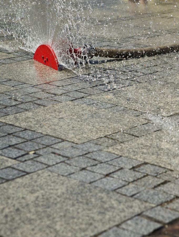 Sprinkler on street stock image. Image of sprinkler, water - 33120915