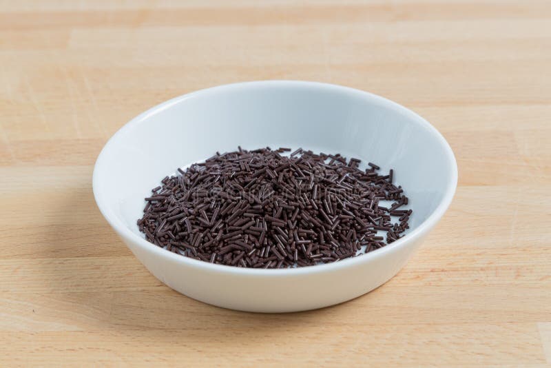 Sprinkles in a Bowl on Wood Stock Photo - Image of sprinkles, chocolate ...