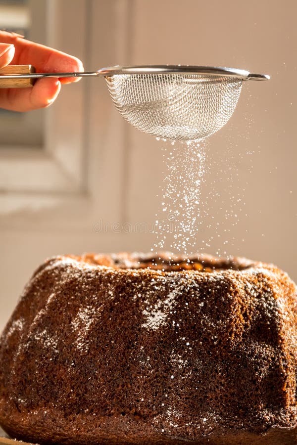 Sprinkling Sugar Powder On Chocolate Donut Stock Image - Image of round ...