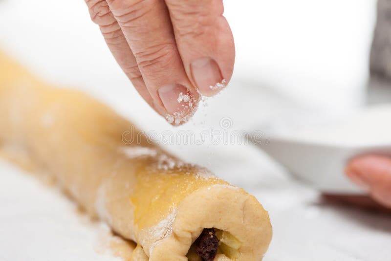 Sprinkling Sugar Over the Rolled Up Strudel Dough Stock Image - Image ...