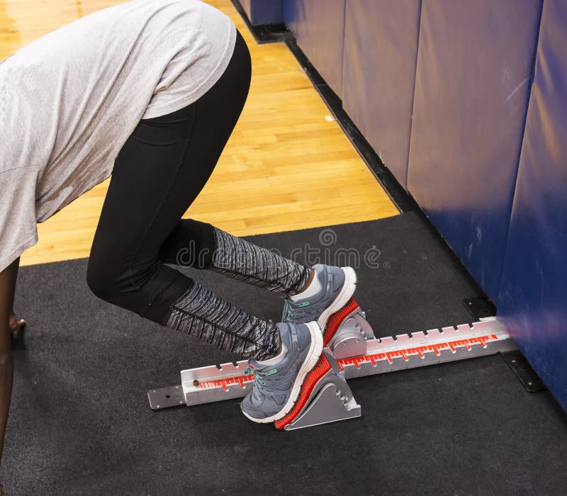Sprinter in the Blocks Training Indoors Stock Image - Image of spandex ...